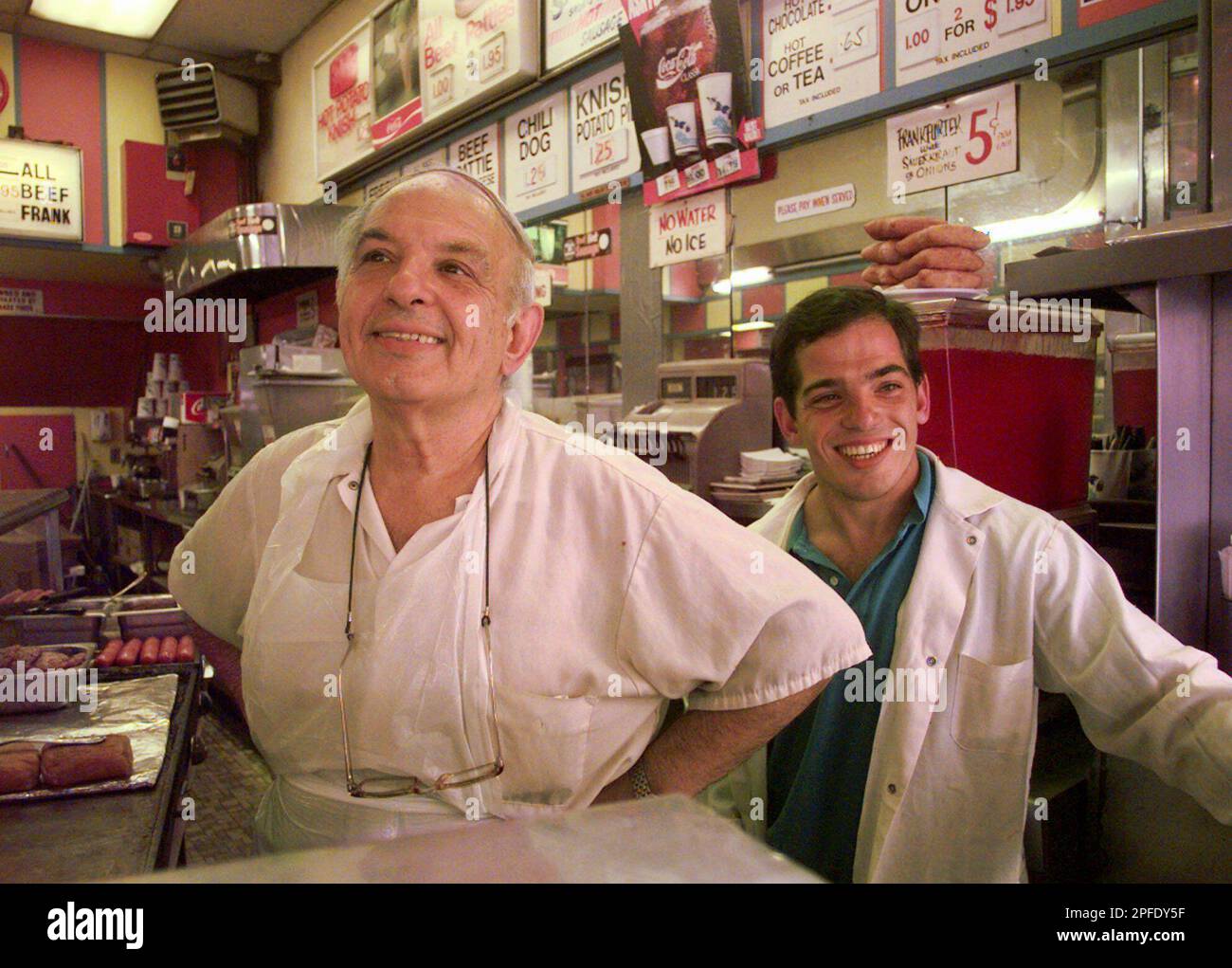 Fred Hakim and his son and Glenn enjoy a light moment at their diner on 42nd Street in New York ...